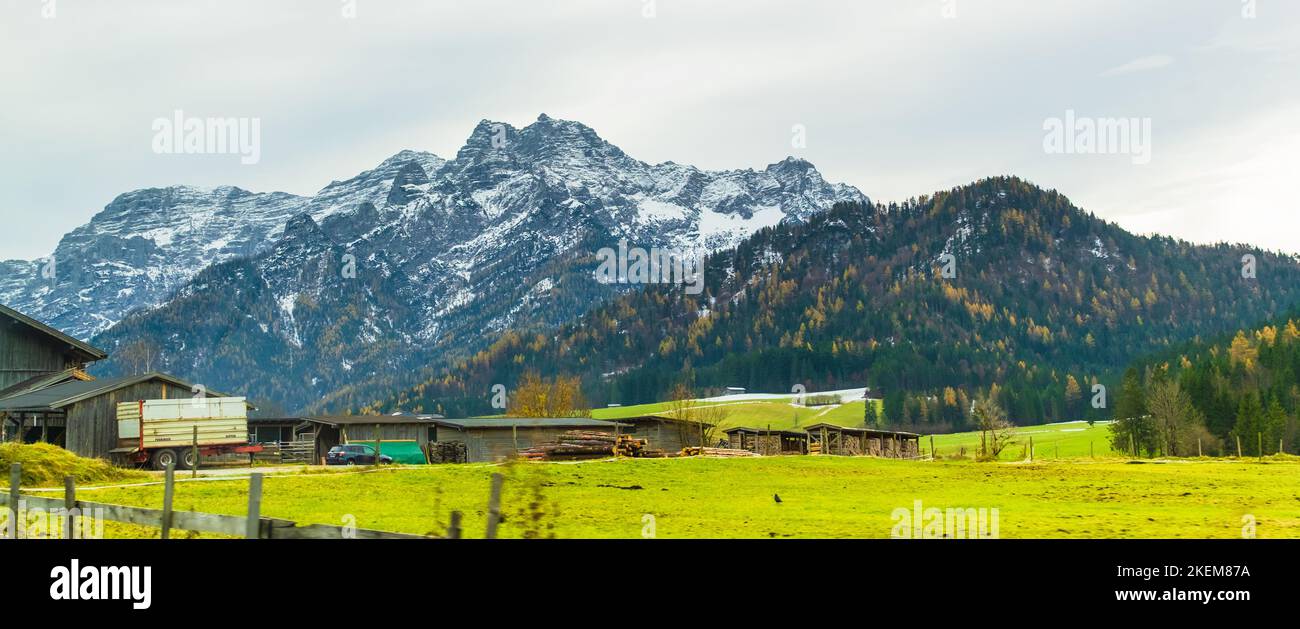 Austrian alps, Green meadows, alpine cottages and mountains Stock Photo ...