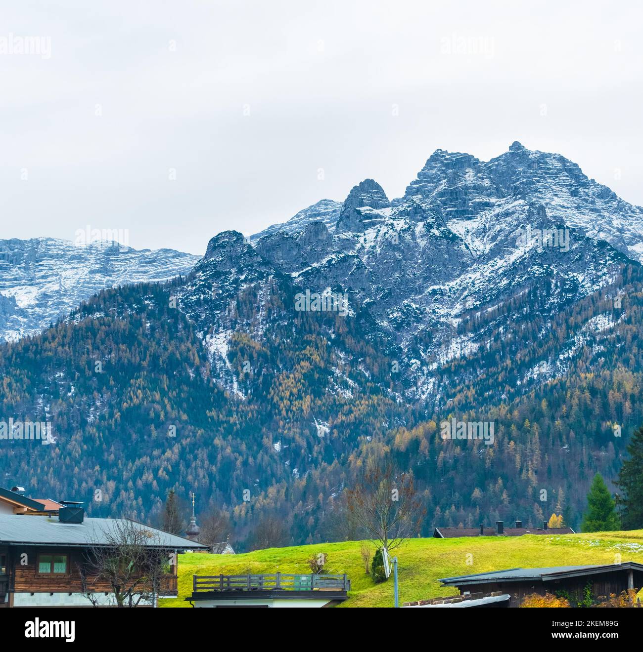 Austrian alps, Green meadows, alpine cottages and mountains Stock Photo ...