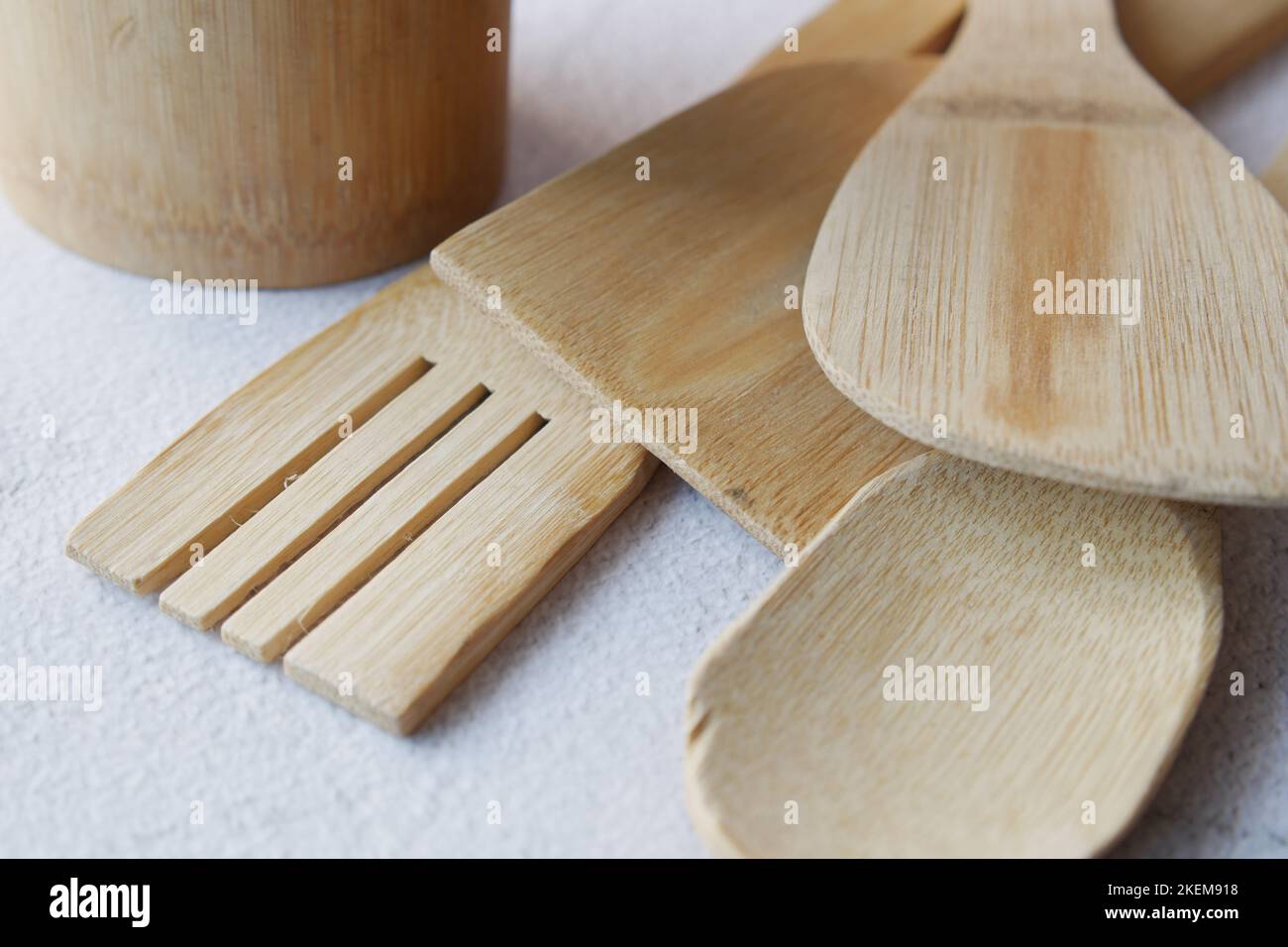 wooden cutlery fork and spoon on a chopping board on table Stock Photo ...