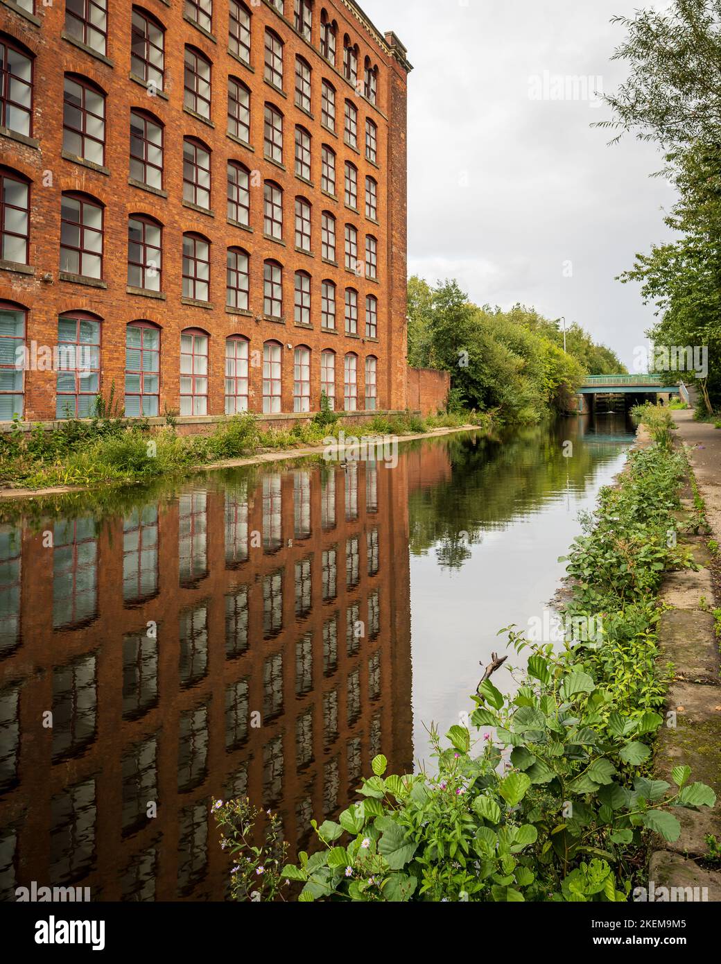 A traditional factory building positioned at the edge of the Rochdale ...