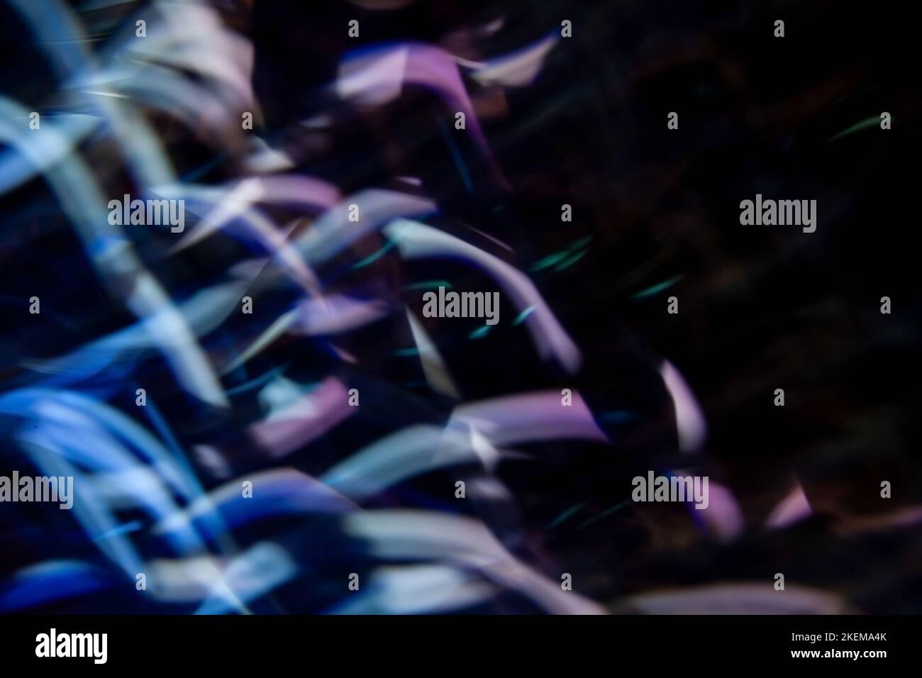blur neon light bokeh rays motion purple blue dark Stock Photo - Alamy