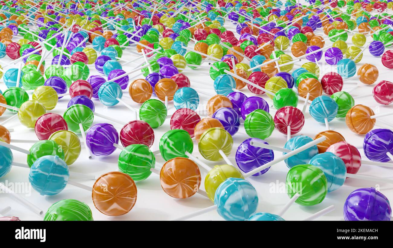 Colorful orange blue purple yellow and green lollipops over white ...