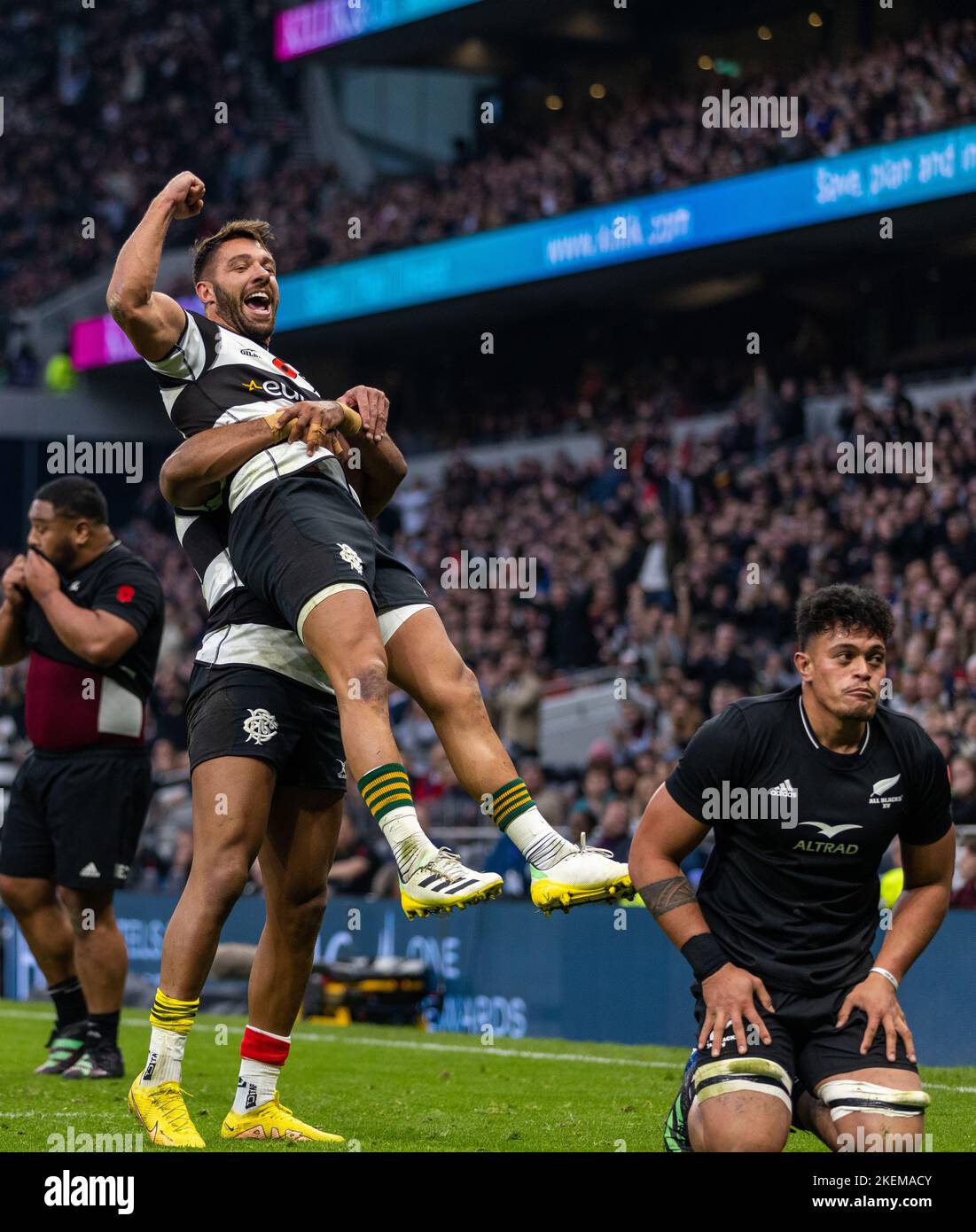Barbarians' Rhys Webb is lifted at full time after winning the match ...