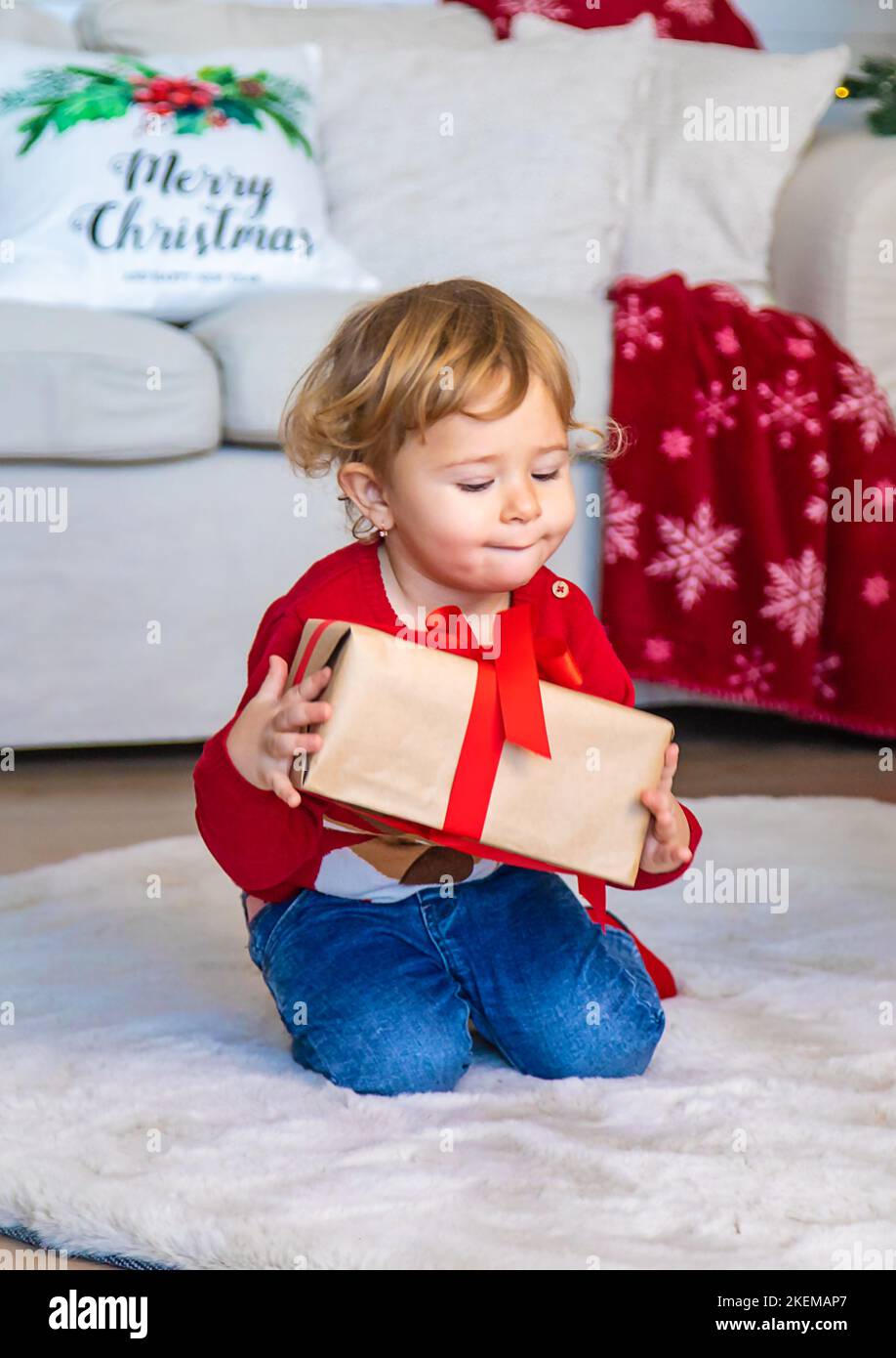 Child in his room decor christmas. Selective focus. Kid Stock Photo - Alamy