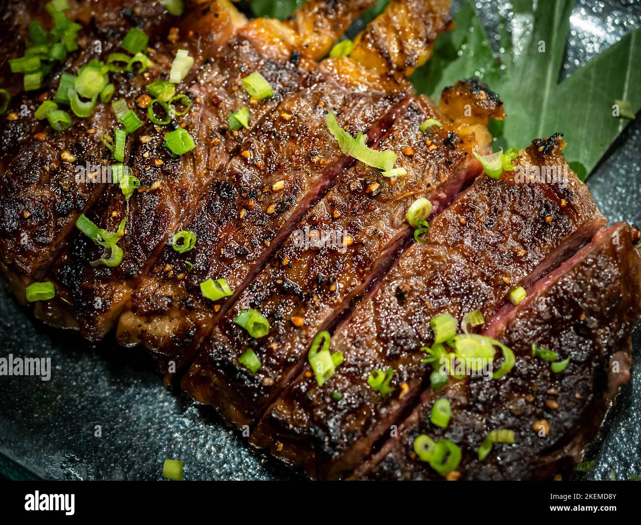 Close-up Australian sliced medium rare wagyu grilled beef steak top ...
