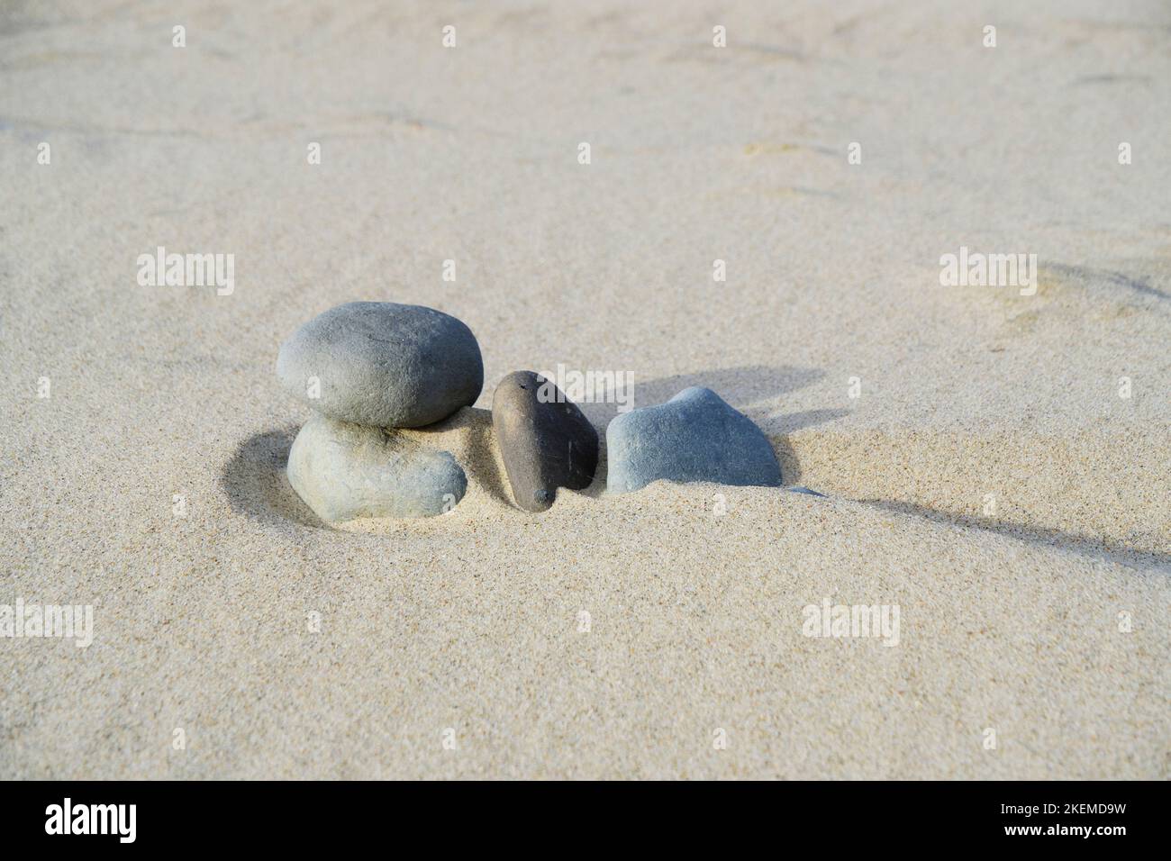 Stones are covered with quartz sand on beach during strong wind Stock ...