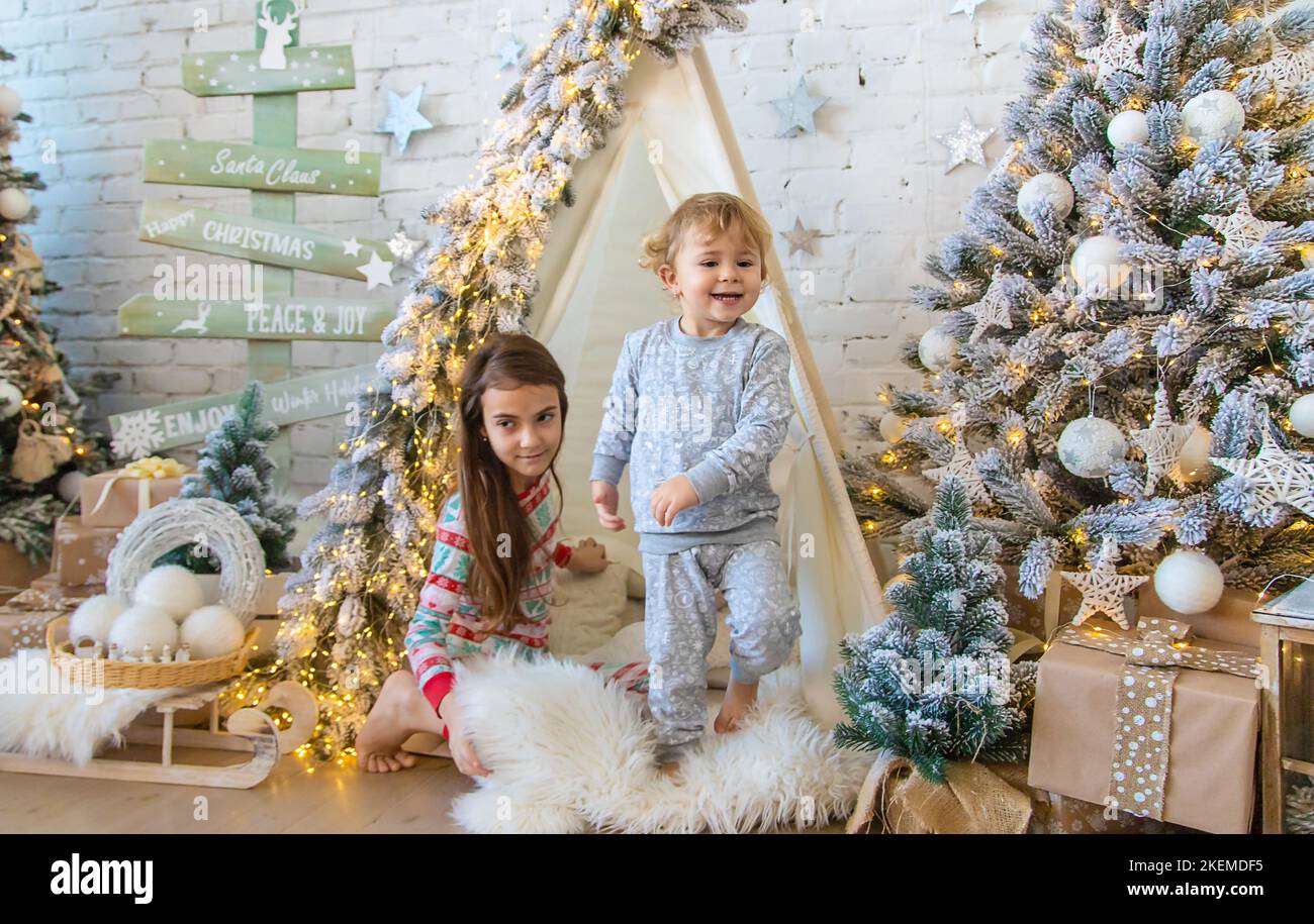 Child in his room decor christmas. Selective focus. Kid Stock Photo - Alamy