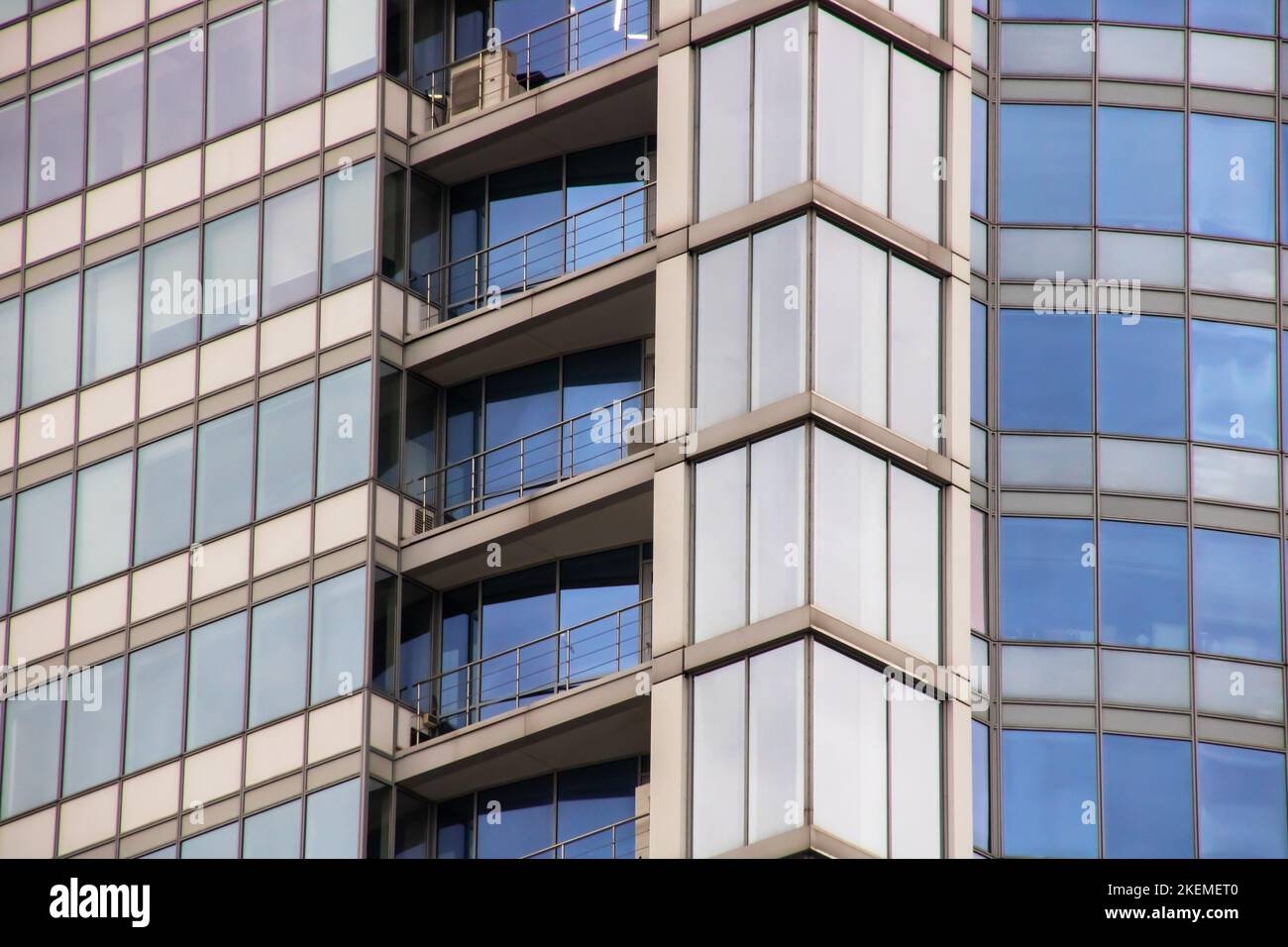 Balconies on a glass tall building close up Stock Photo - Alamy