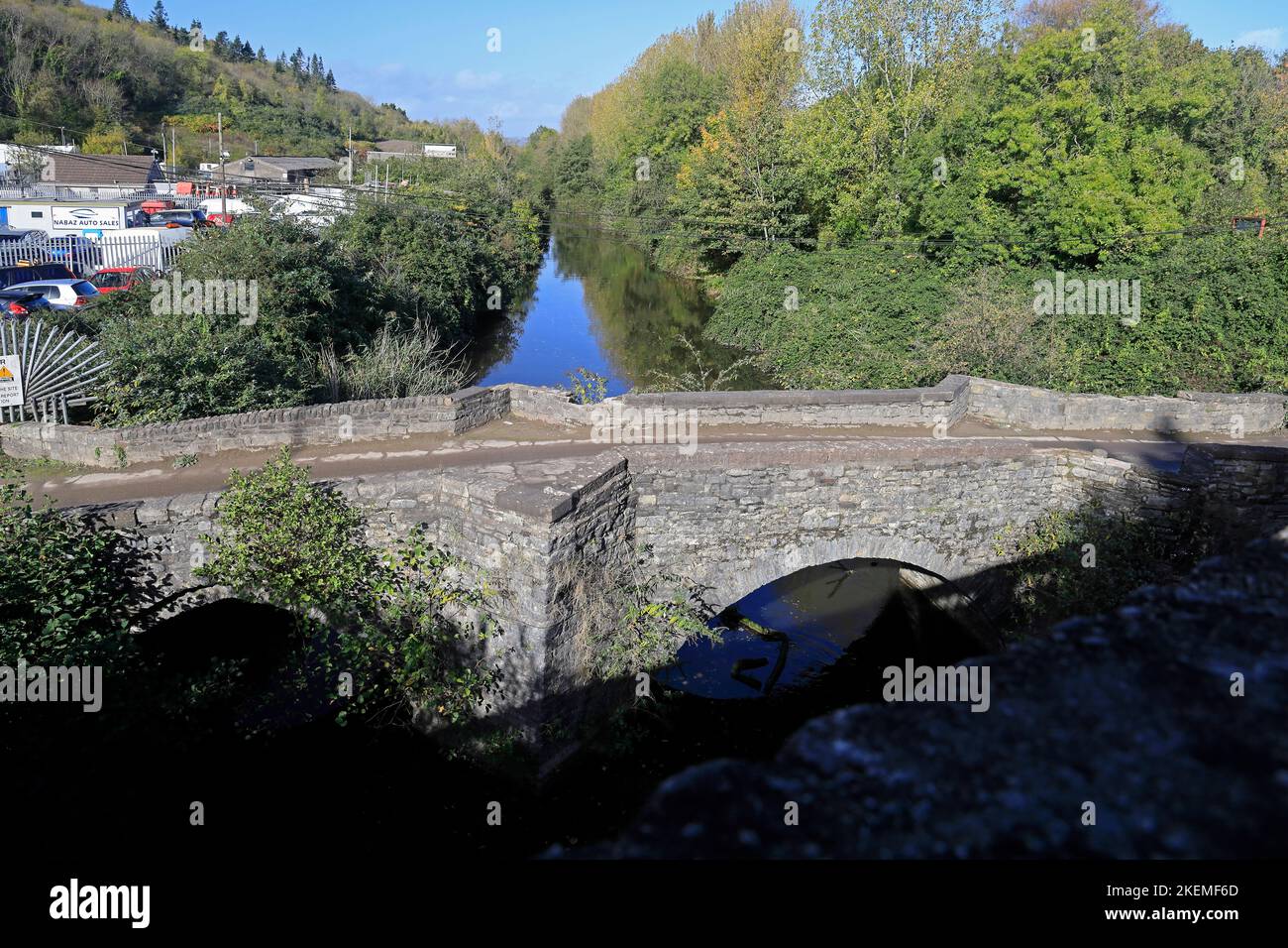 The old stone triple-arched Leckwith Bridge crosses the River Ely ...