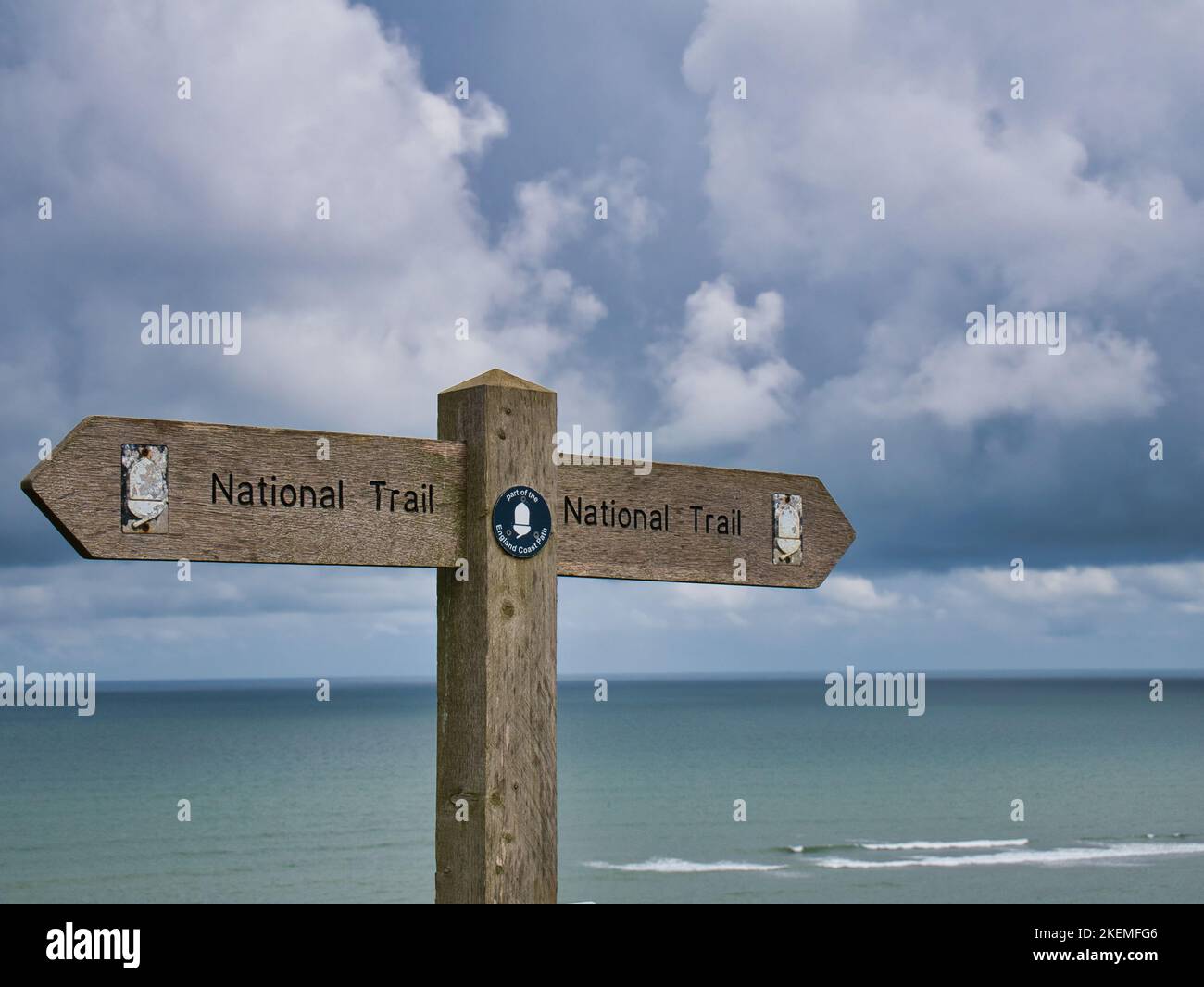A weathered wooden fingerpost points the way on the North Norfolk Coast ...