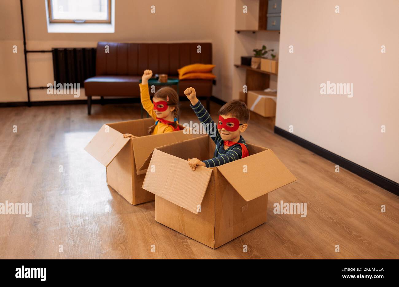 Superhero children. Super hero kids, brother and sister, playing at ...