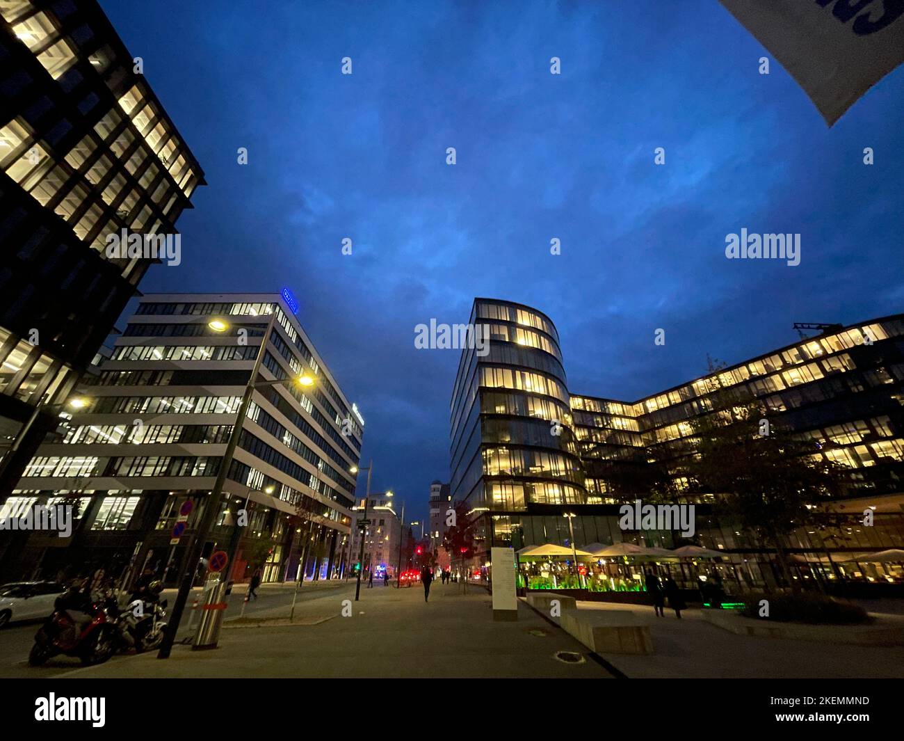 Downtown cityscape at dusk, modern corporate glass buildings with ...