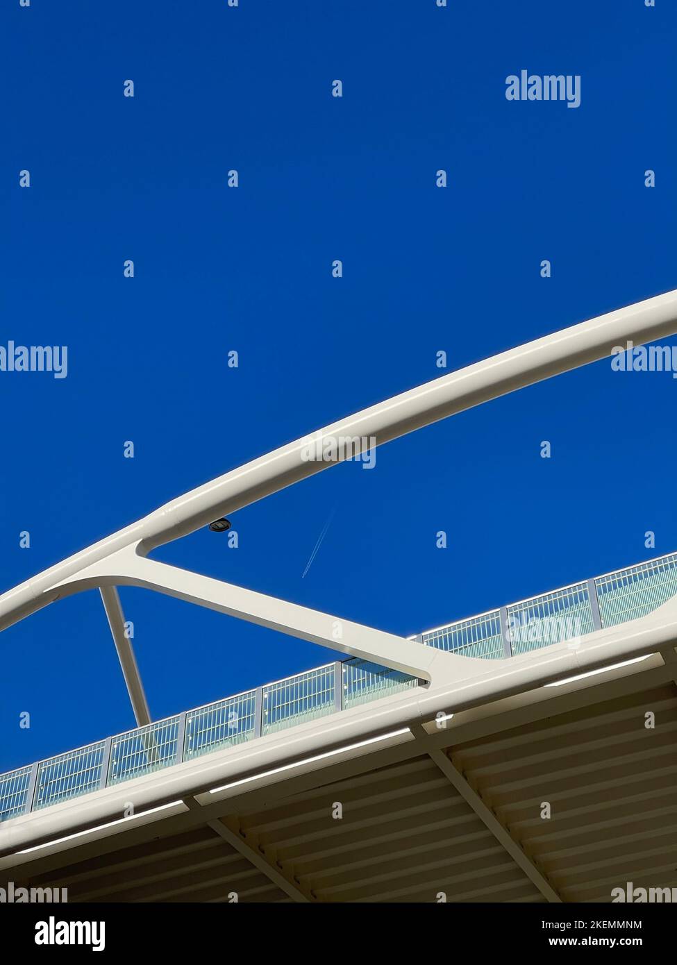 Vertical cropped shot of beautiful metal structure of a modern white ...