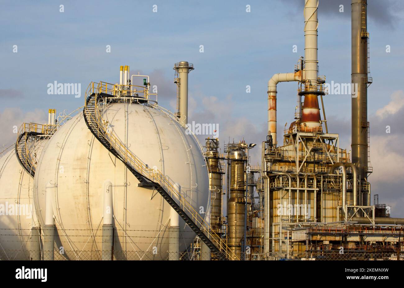 A large oil-refinery plant with Liquefied Natural Gas - LNG - storage ...