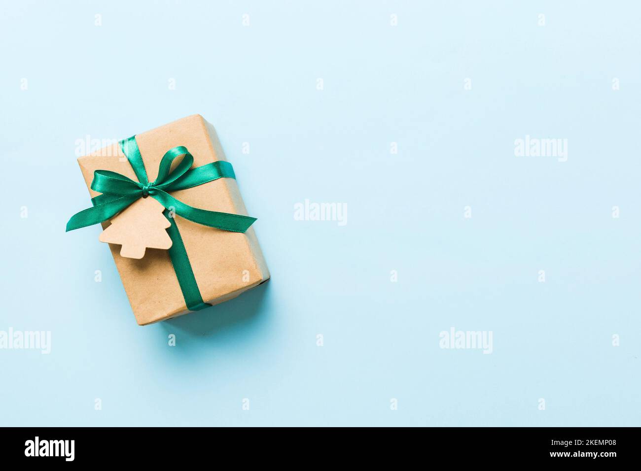 wrapped christmas or other holiday handmade present in paper with ...