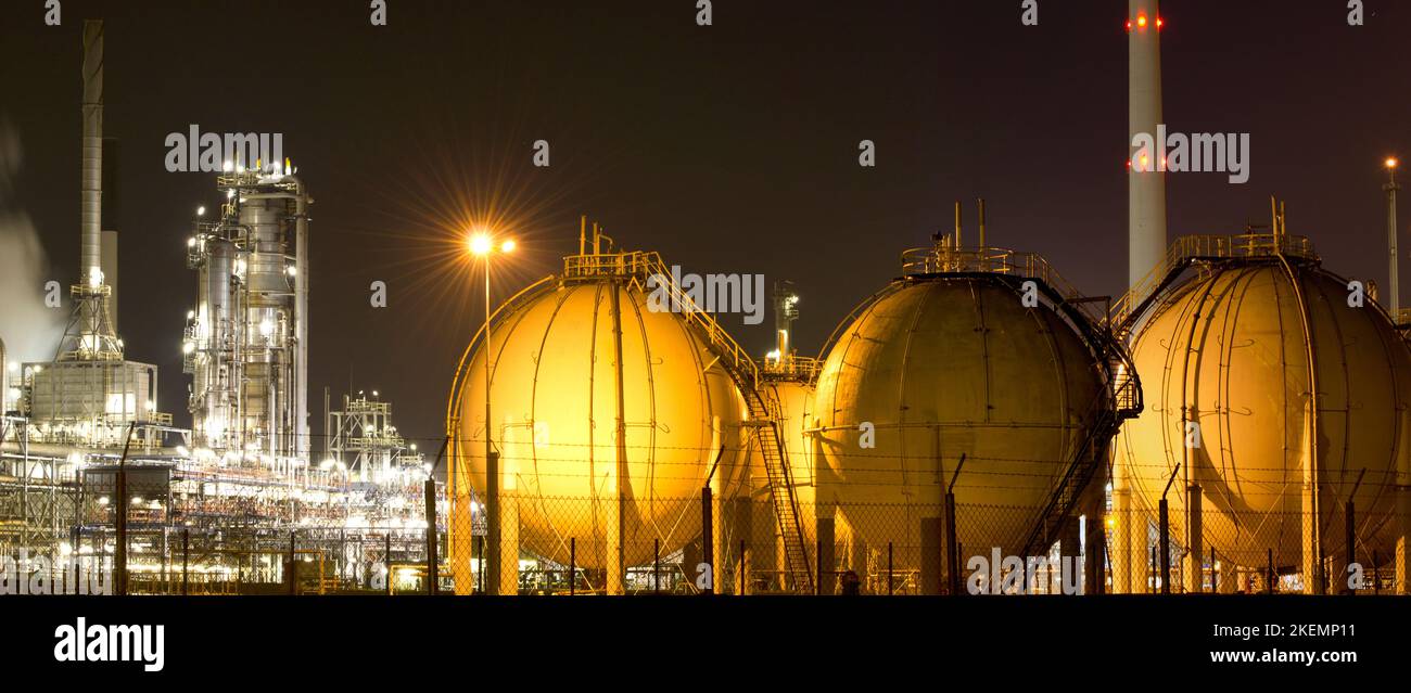 A large oil-refinery plant with Liquefied Natural Gas - LNG - storage ...