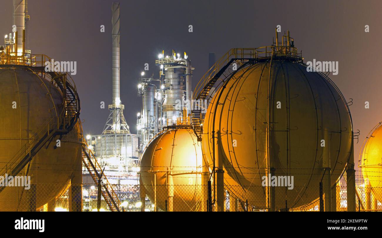 A large oil-refinery plant with Liquefied Natural Gas - LNG - storage ...