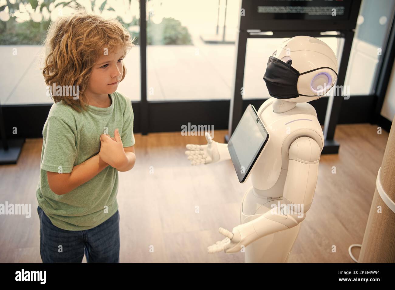 little boy interact with robot artificial intelligence, future tech ...