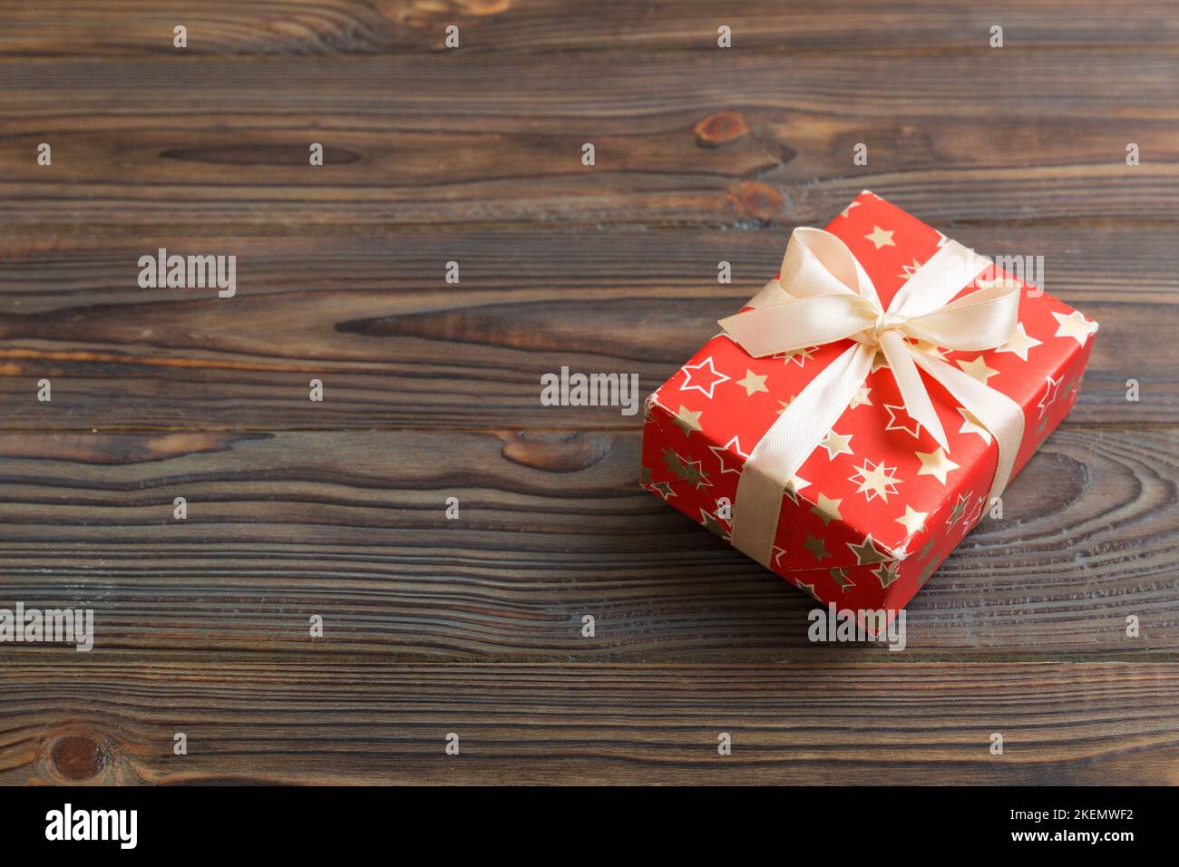 Wrapped christmas or other holiday handmade present in paper with ...