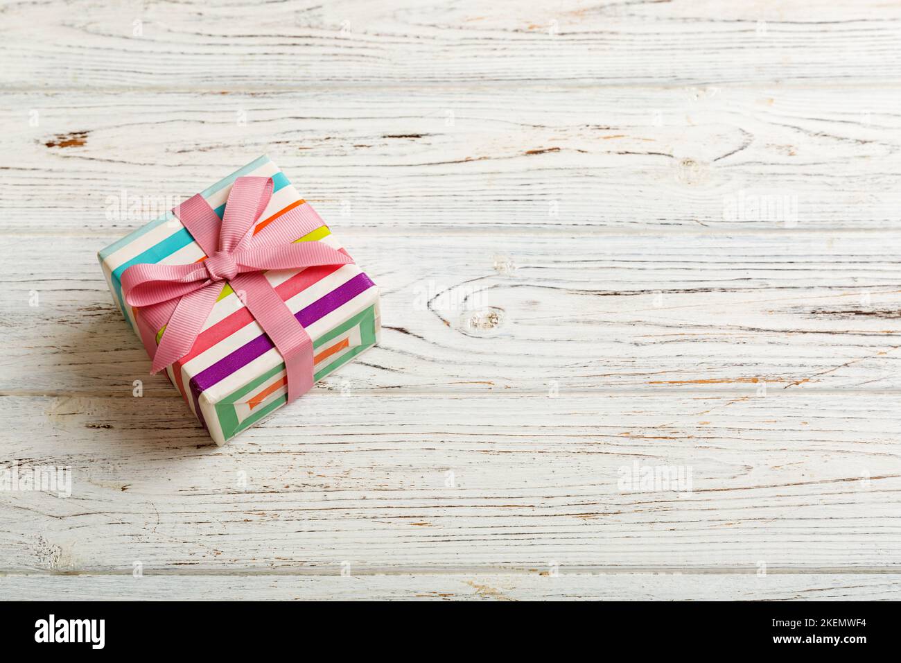 wrapped Christmas or other holiday handmade gift box in color paper ...