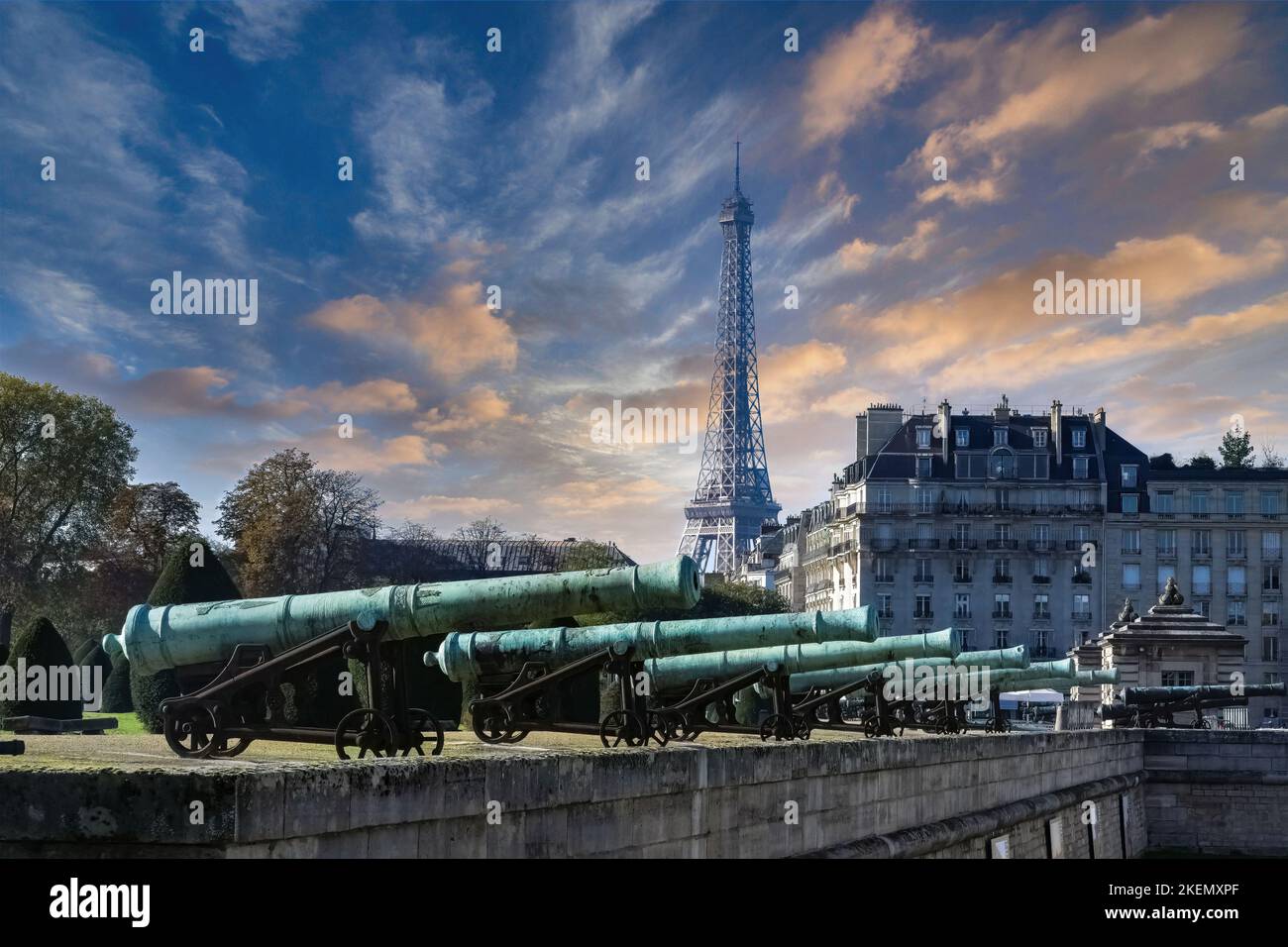 Paris, the esplanade des Invalides, with cannons, and the Eiffel Tower ...