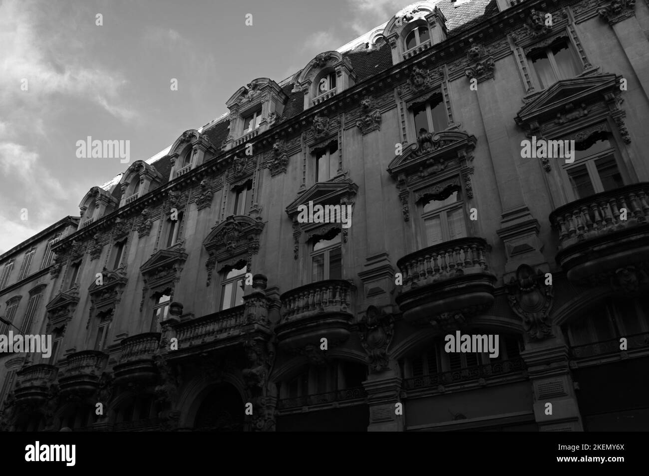 An exterior view of French architectural features on a row of buildings ...