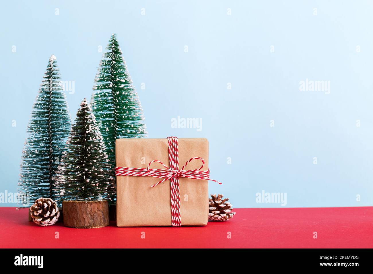 Christmas composition. Gifts, small tree, branches and craft DIY ...