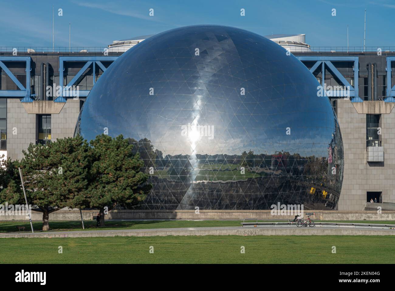 Villette Canal. View of La Geode and building of the Science and ...