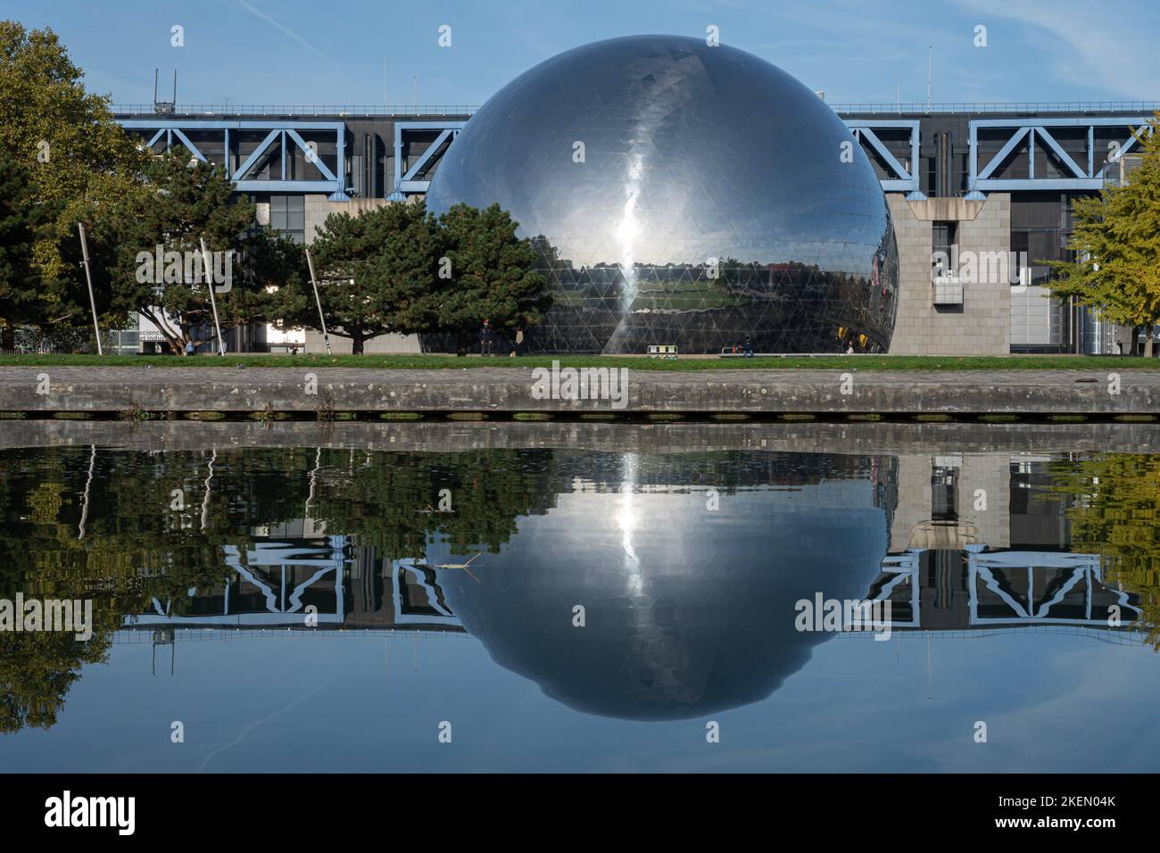 Villette Canal. View of La Geode and building of the Science and ...