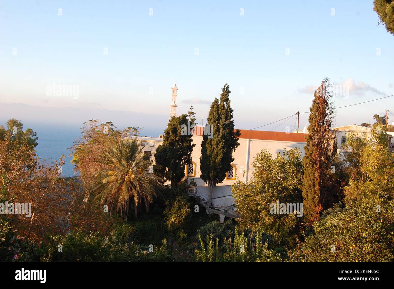 church behind trees Stock Photo - Alamy