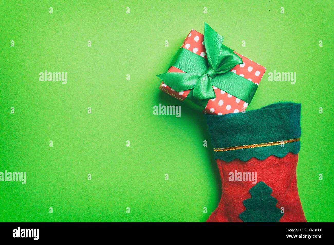 santa red sock top view on the color background with empty space ...