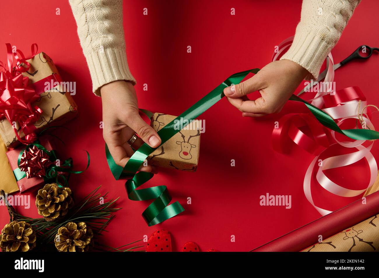 Woman hands tied up ribbon hi-res stock photography and images - Alamy