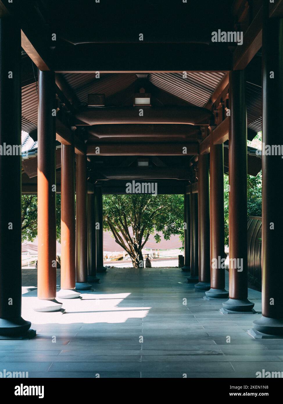 A vertical shot of a corridor of a Chinese temple Stock Photo - Alamy