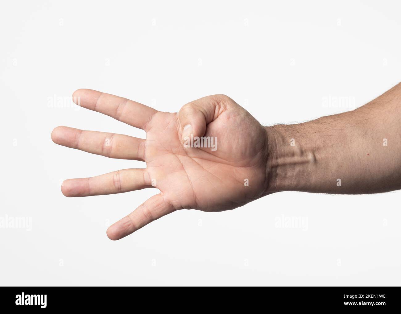 A man's hand and arm on a nuclear white background, showing a gesture ...