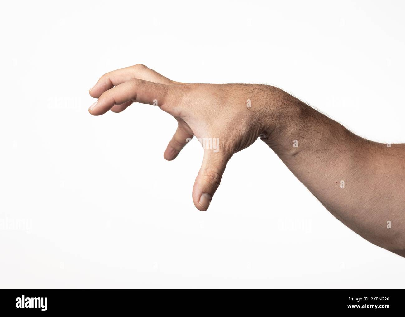 A man's hand and arm on a nuclear white background, showing a gesture ...