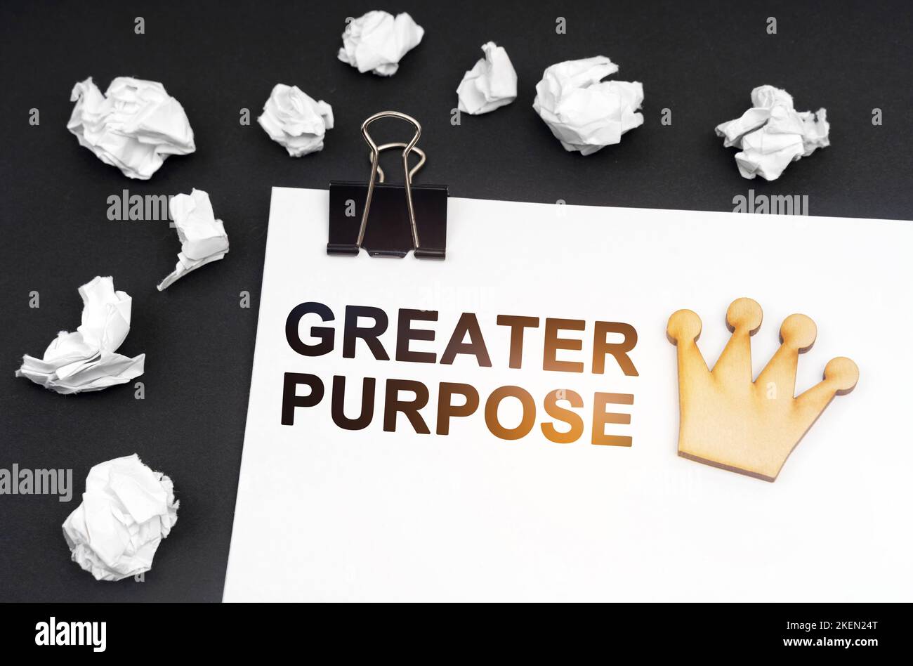 Business and finance concept. On a black background, crumpled paper and ...