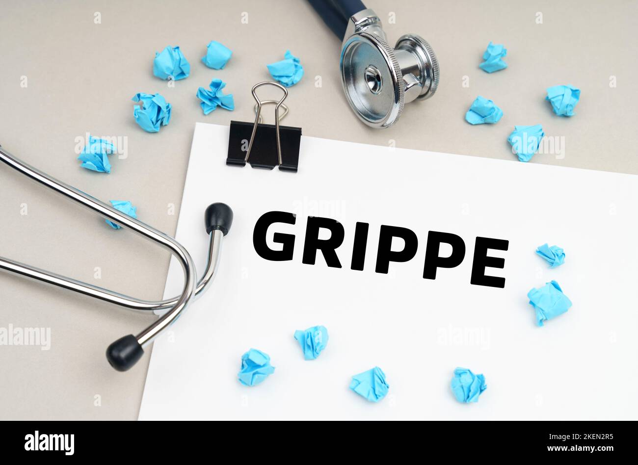 Medicine concept. On the table is a stethoscope, a pen, blue crumpled ...