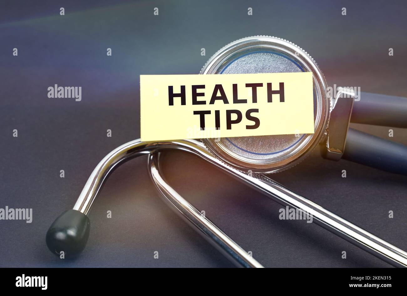 Medicine concept. On a black background, a stethoscope, on which a ...