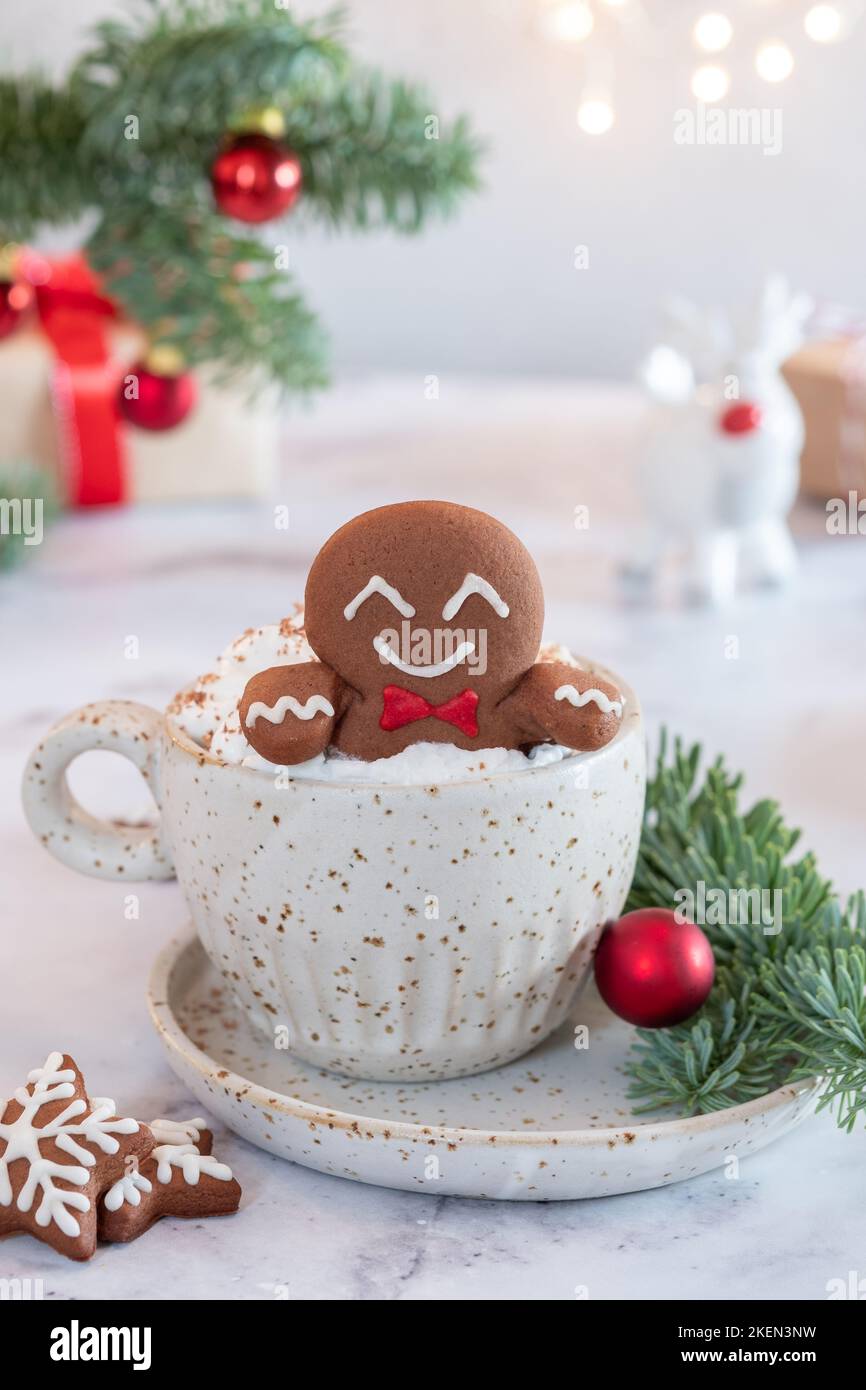 Gingerbread cookie man in a hot chocolate Stock Photo - Alamy