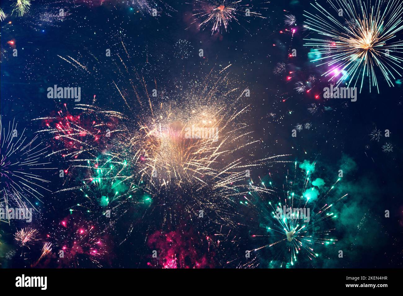 Colorful firework over dark sky Stock Photo - Alamy