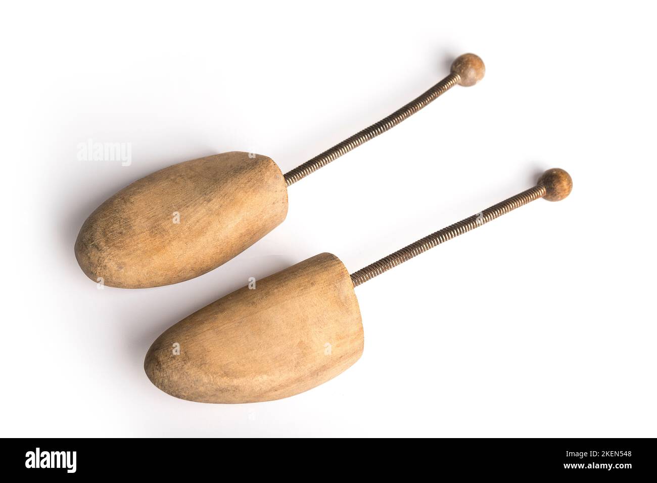 Wooden retro shoes stretcher on a white Stock Photo - Alamy