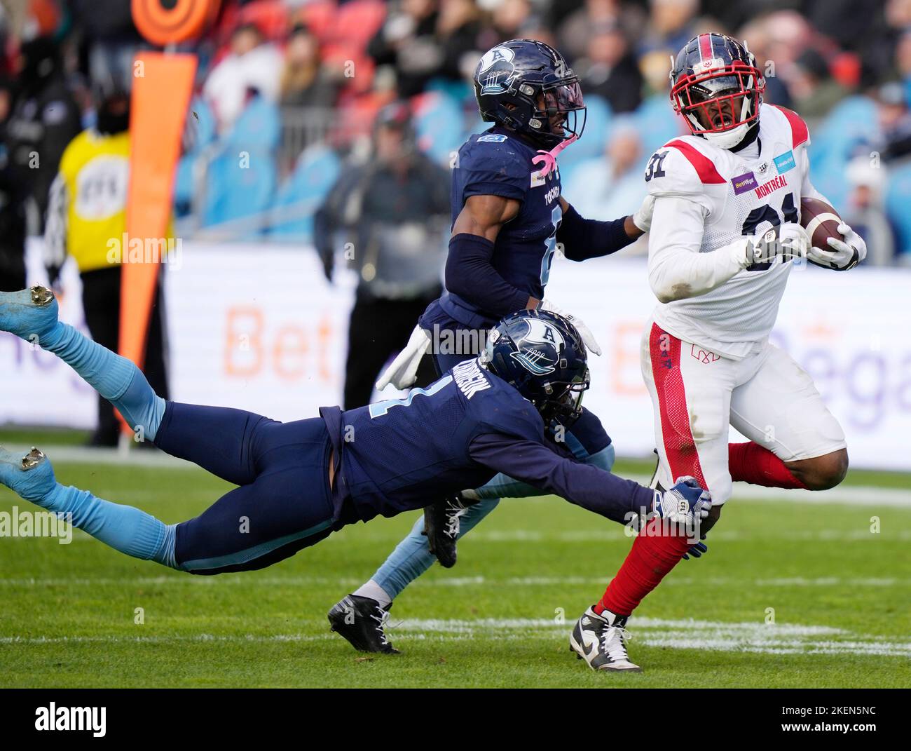 Montreal Alouettes running back William Stanback (31) dodges a tackle ...