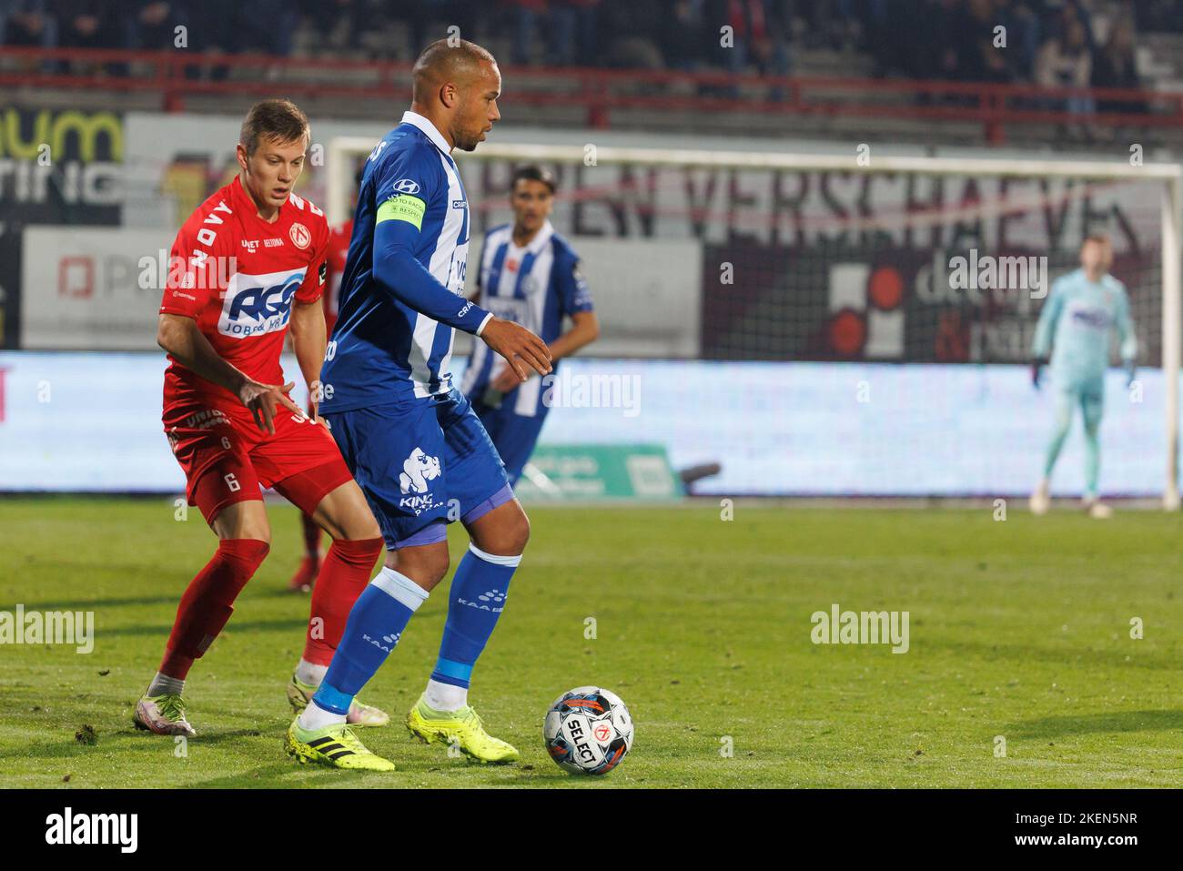Kortrijk's Oleksii Sych and Gent's Vadis Odjidja-Ofoe fight for the ball during a soccer match ...