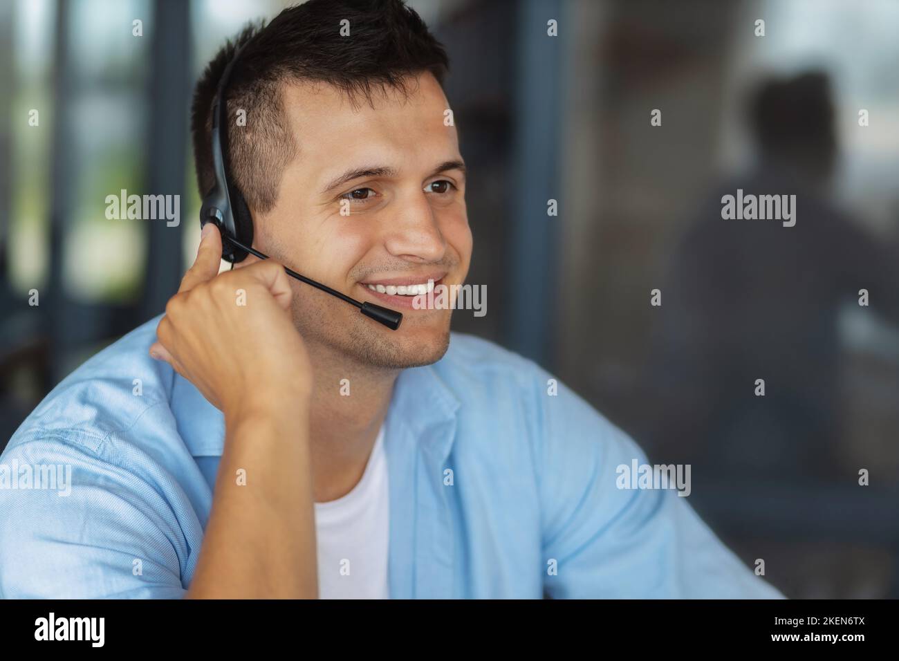 Male employee customer support services in headset, online consultation ...