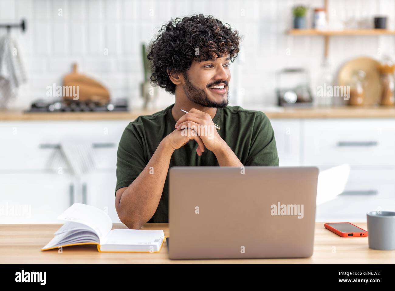 Distance learning Portrait of smiling young Asian male freelancer or ...