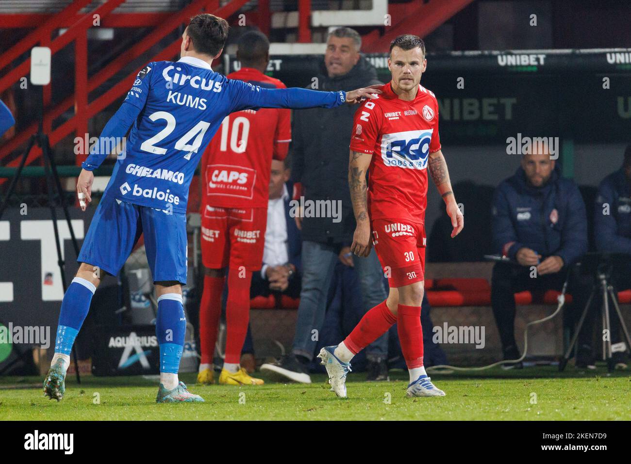 Kortrijk's Kristof D'Haene looks dejected after he receives a red card ...