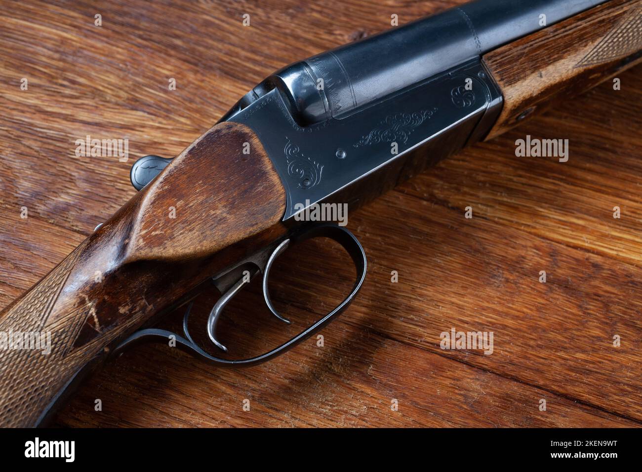 Antique 16-gauge break-action smooth-bored shotgun on woden table Stock ...
