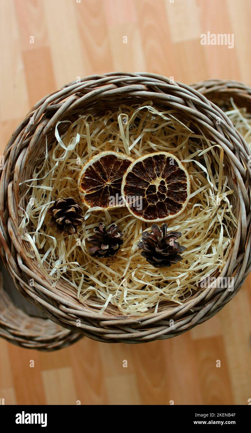 Home Decor Ideas. Vintage Wicker Basket Rack With Wood Shawings, Dried ...