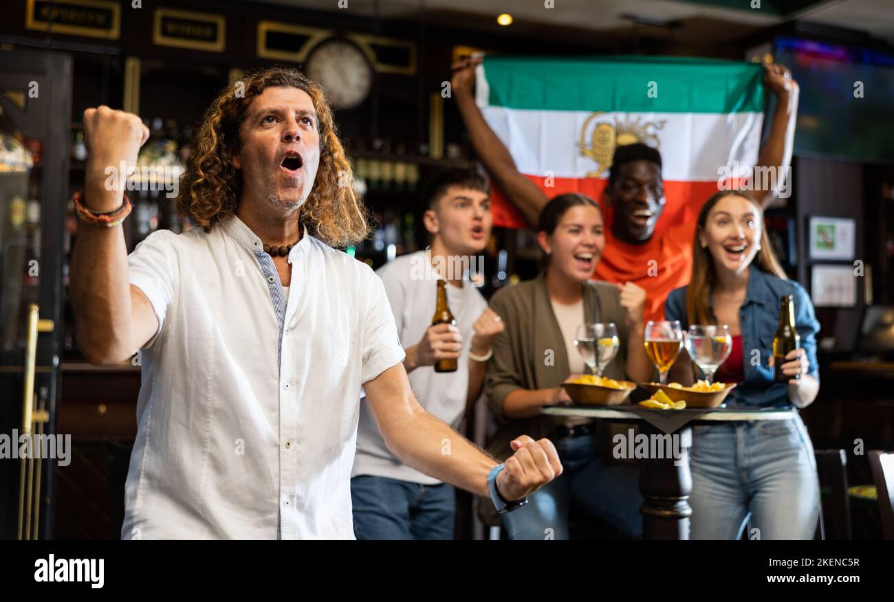 Emotional sports fan celebrating hi-res stock photography and images ...