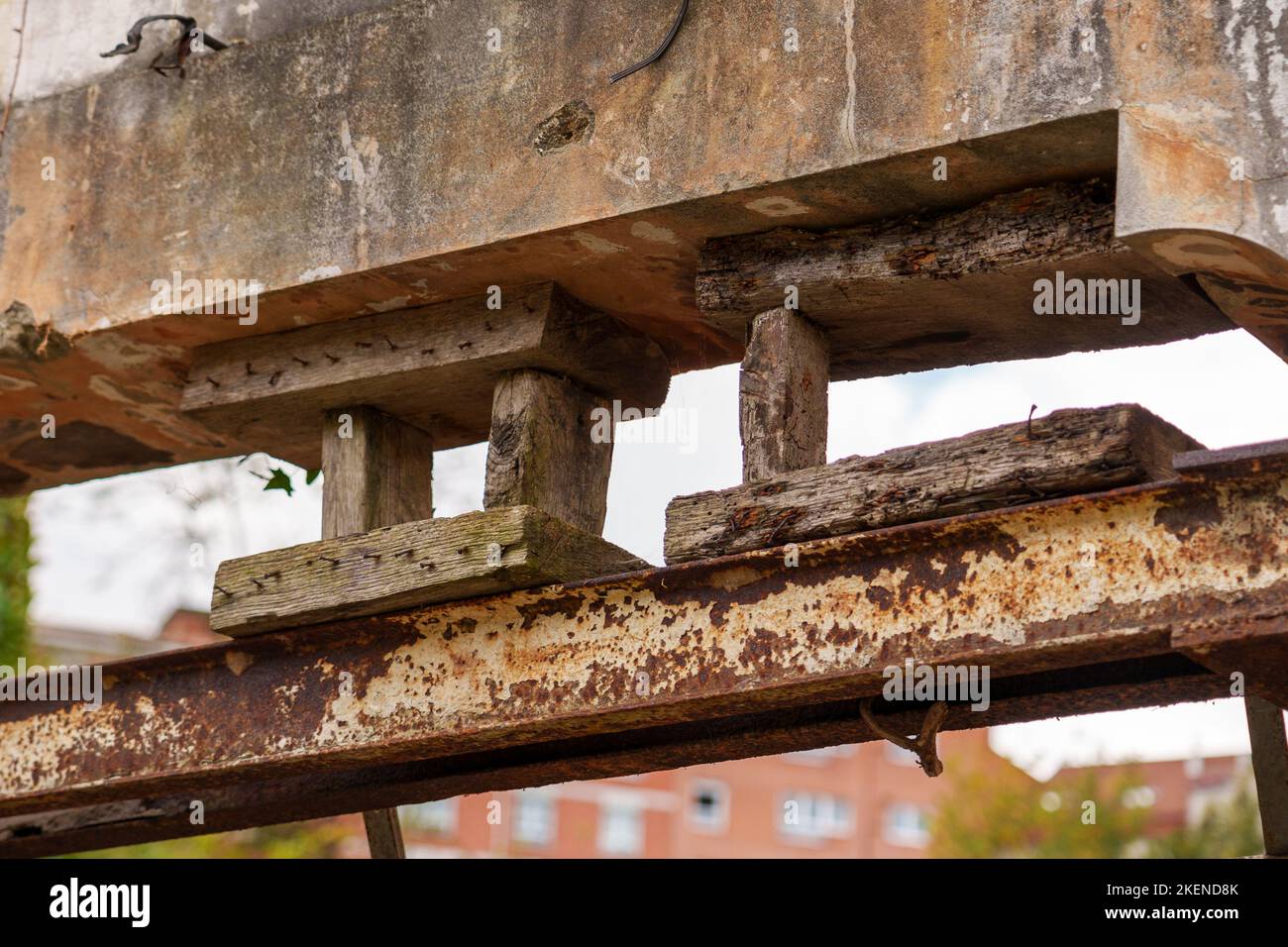Broken wooden supports of metal beams of the bridge engineering ...
